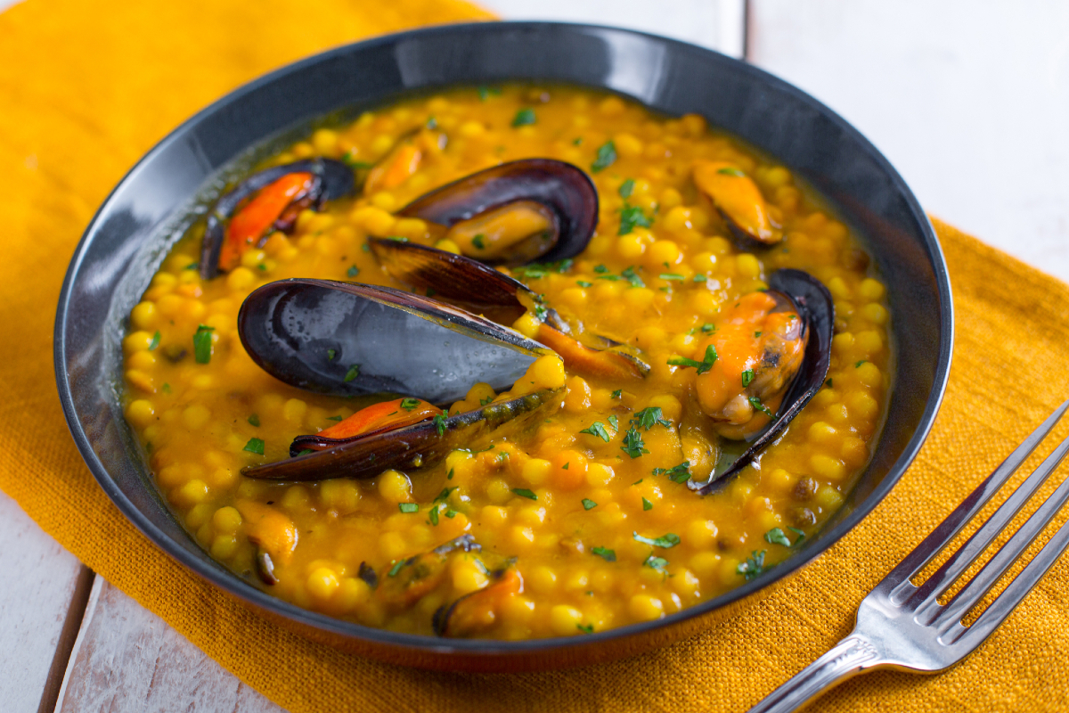 Fregola with pumpkin and mussels - Italian recipes by GialloZafferano