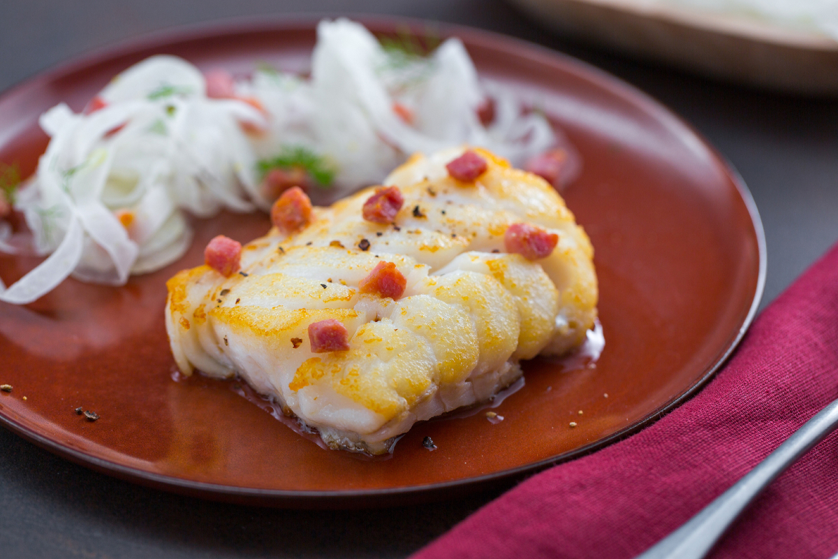 Cod in a pan with fennel and bacon salad - Italian recipes by ...