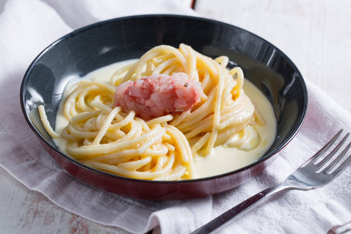 Spaghetti with Monte Veronese sauce and sea bass tartare - Italian ...